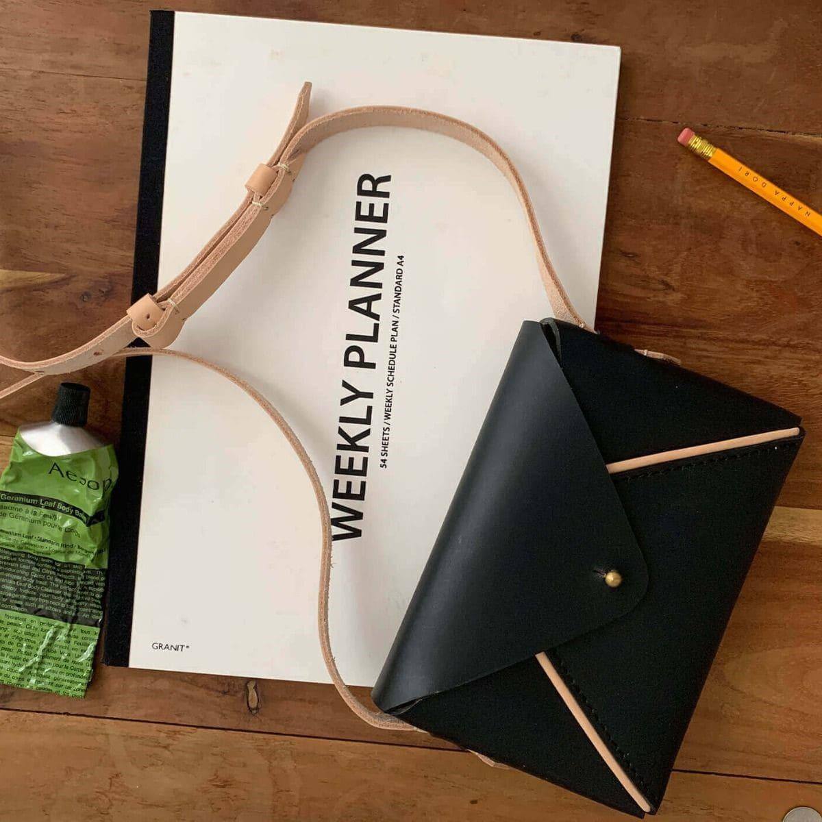 Nappa Dori Envelope Sling Bag - Black